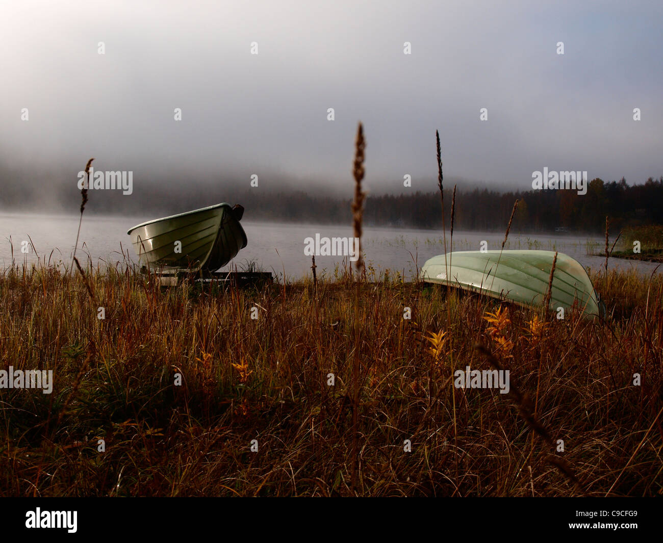 Boats in a fog Stock Photo - Alamy