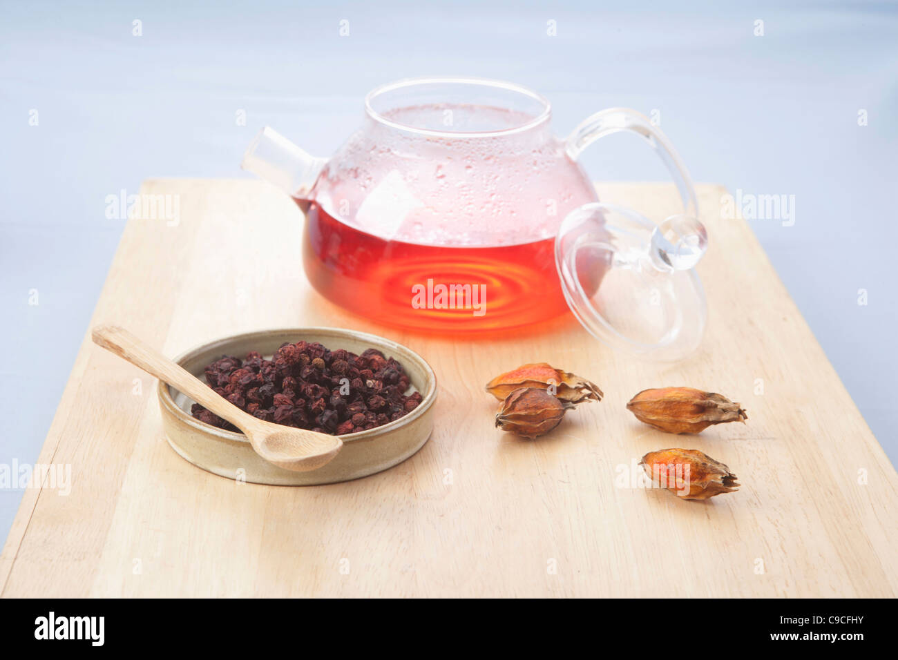 Cups of Omija tea and its dried fruits Stock Photo - Alamy