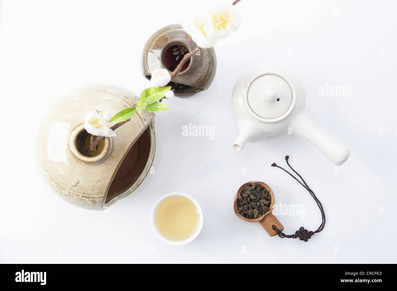 Tea pot and a cup of green tea Stock Photo - Alamy