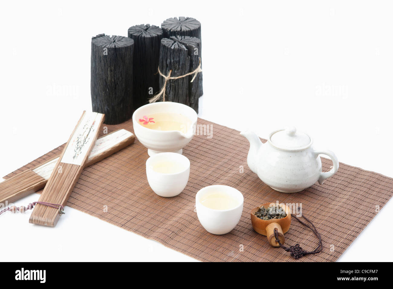 Tea set with charcoal and fans Stock Photo - Alamy