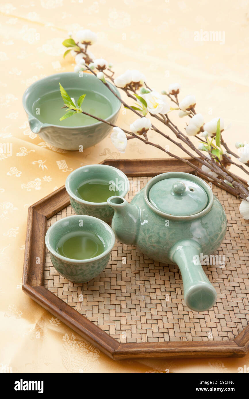 Classical jade tea set with cherry blossom Stock Photo - Alamy