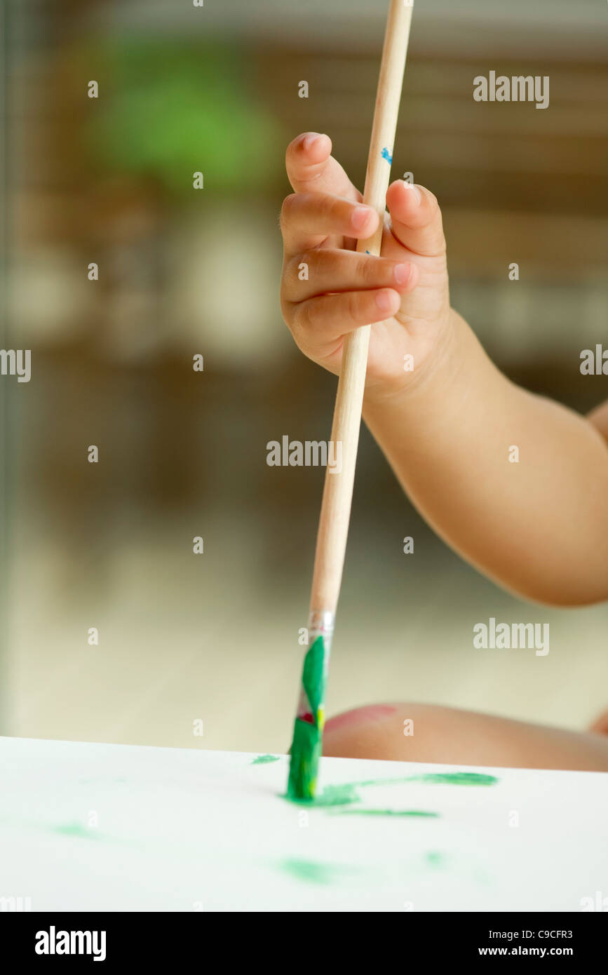 Childs hand holds one hi-res stock photography and images - Alamy