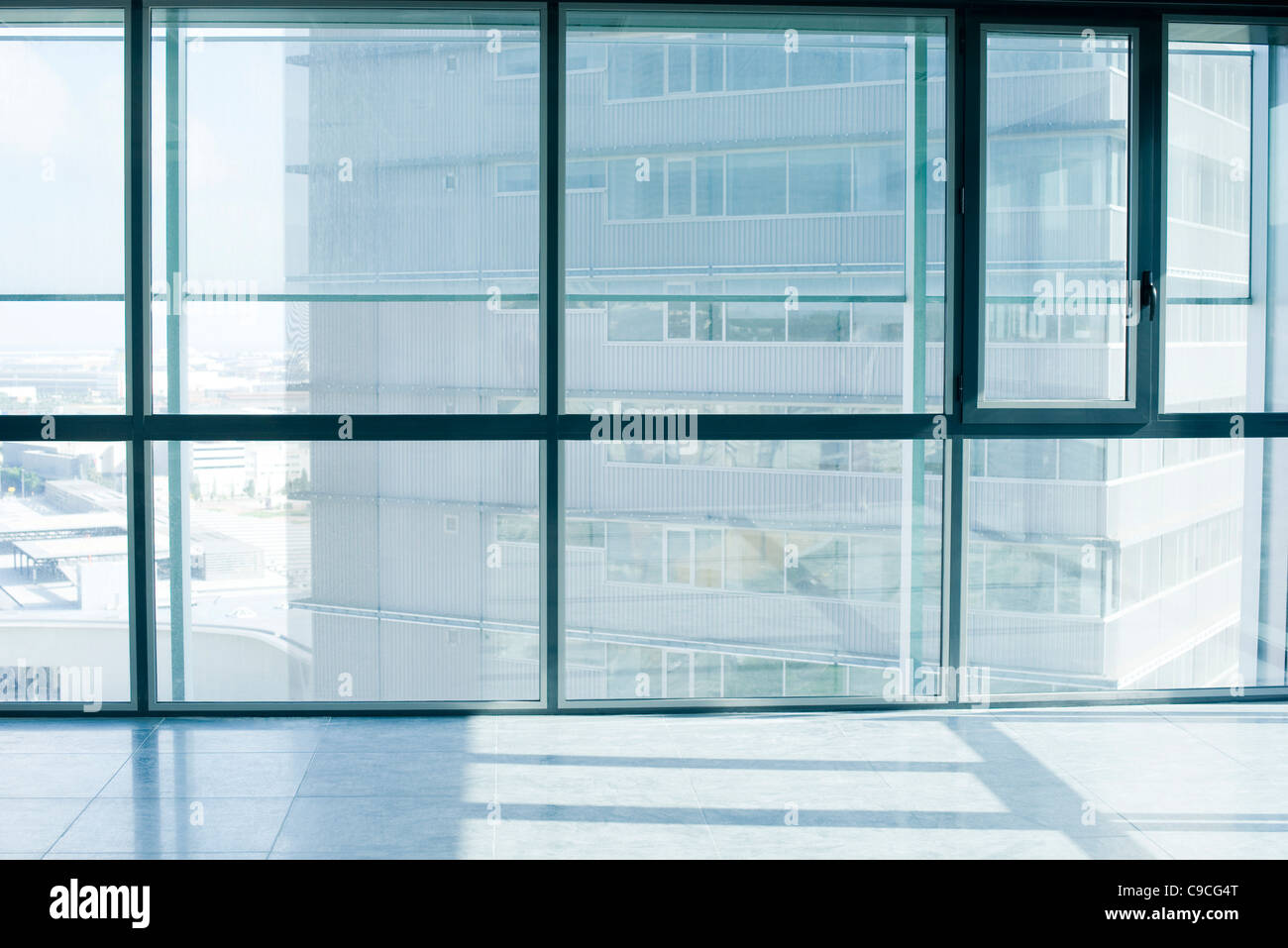 Empty room with bay windows Stock Photo - Alamy