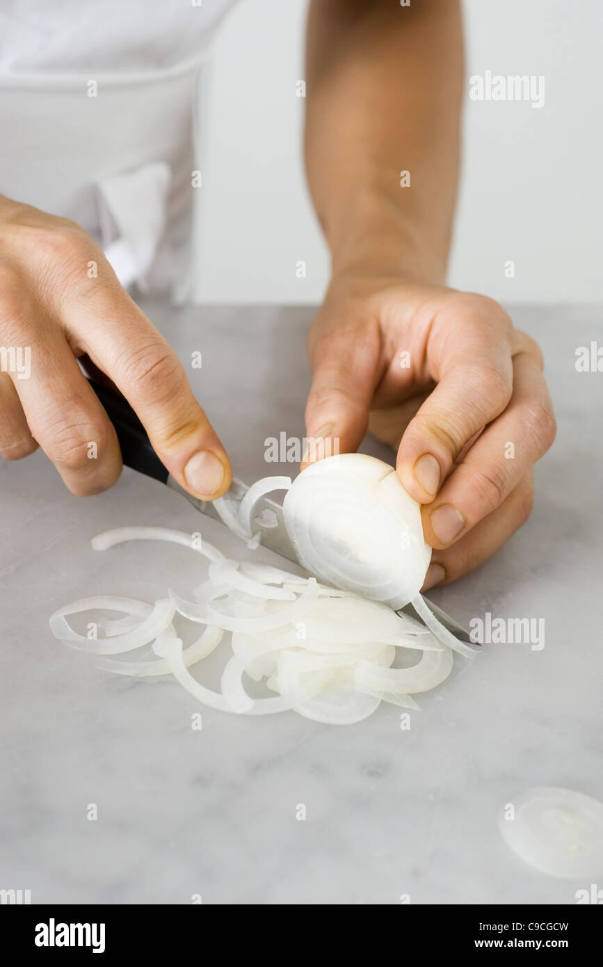 Onion cutting chefs hands knife hi-res stock photography and images - Alamy