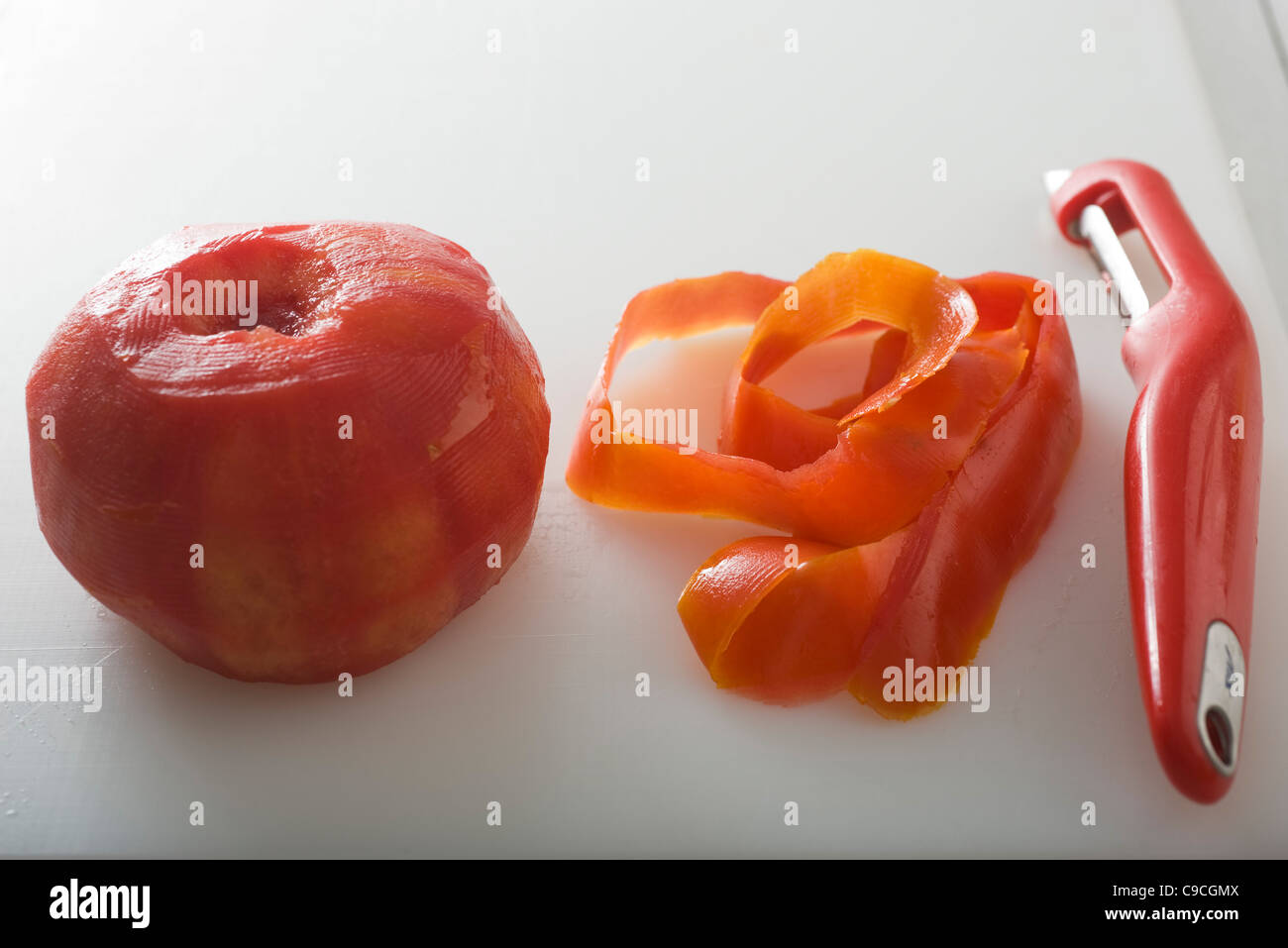 Red tomato peeled hi-res stock photography and images - Alamy