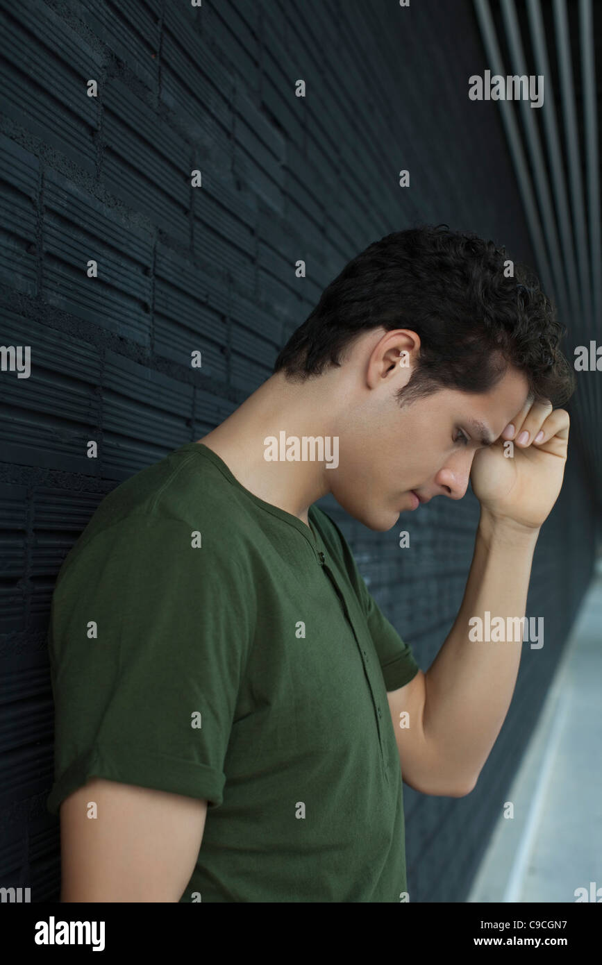 Man with worried expression Stock Photo - Alamy