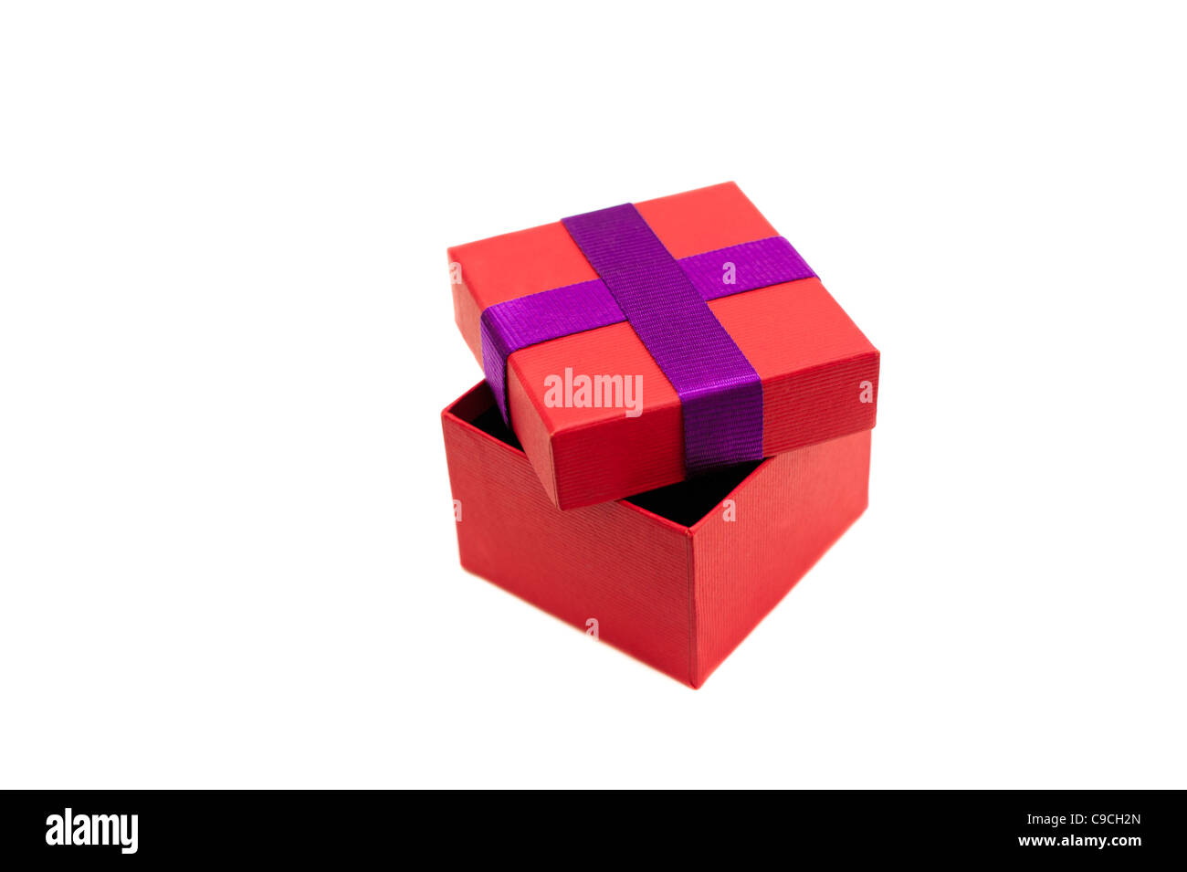Purple gift box golden Cut Out Stock Images & Pictures - Alamy