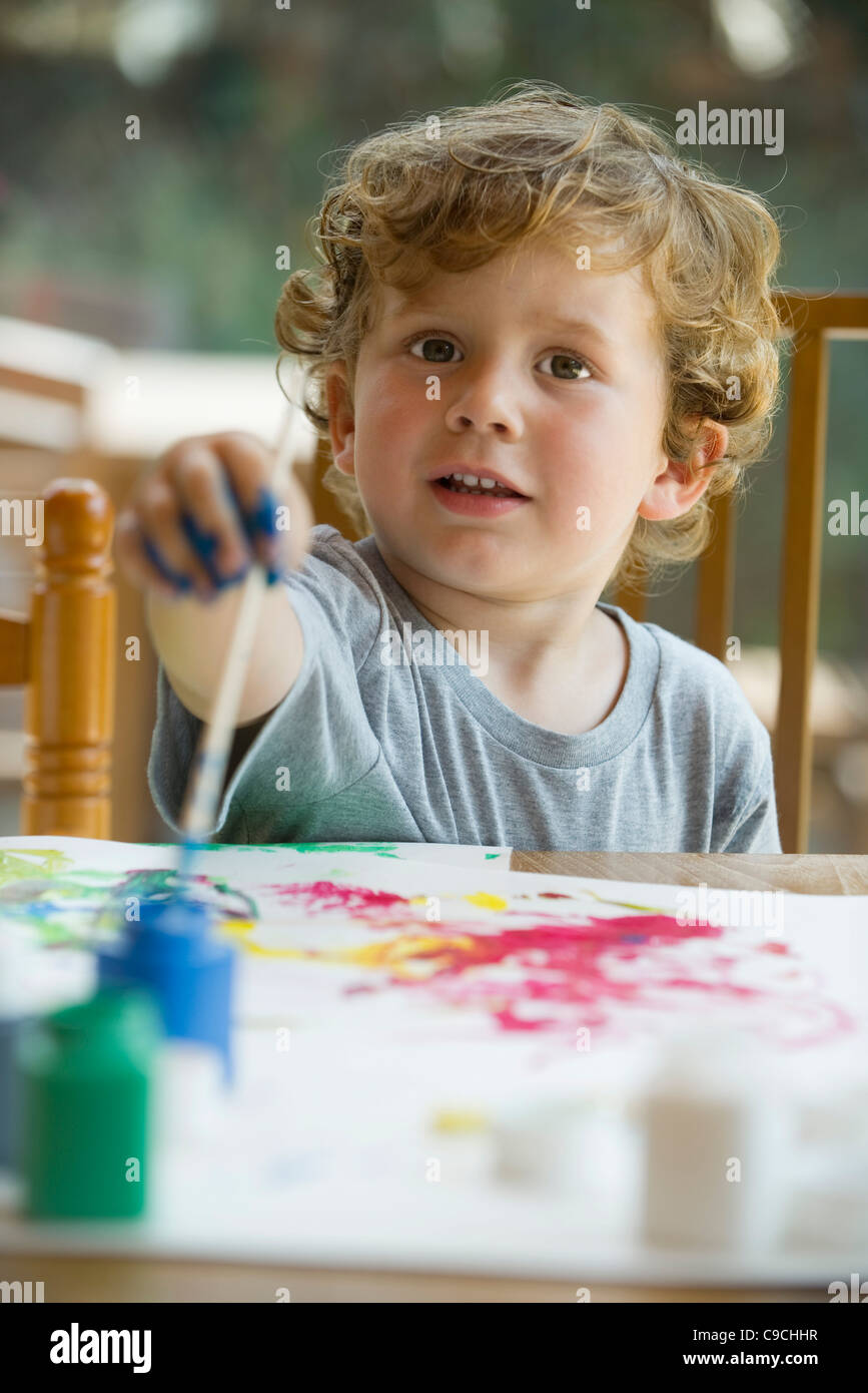 Little boy painting Stock Photo - Alamy