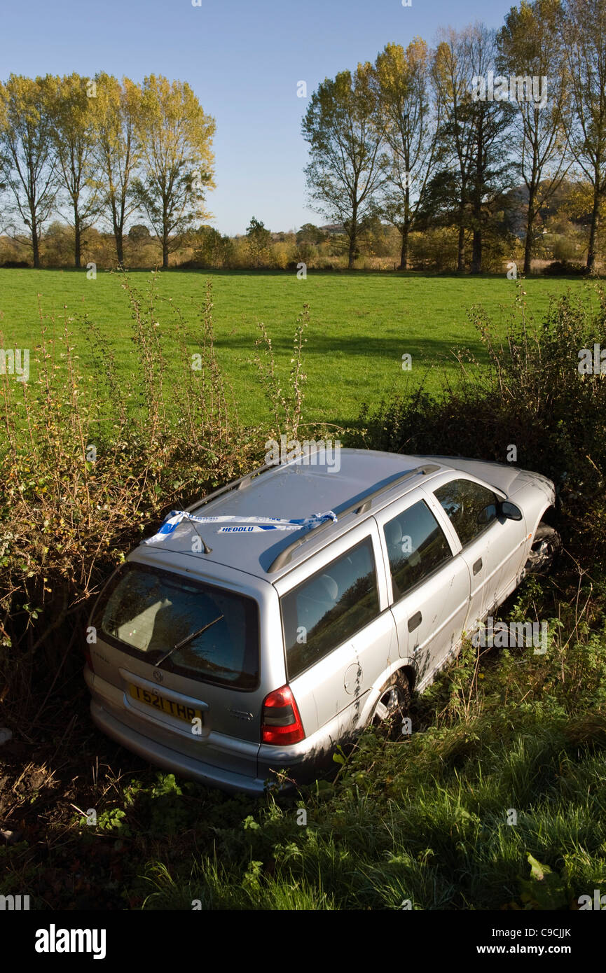 Vauxhall Vectra estate car in hedge in countryside at Glasbury-on-Wye ...