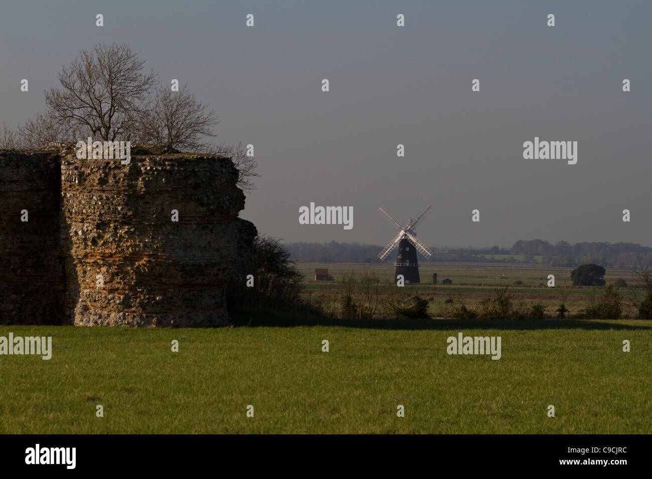 A view of Berney Arms windmill from Burgh Castle Roman Fort of the ...