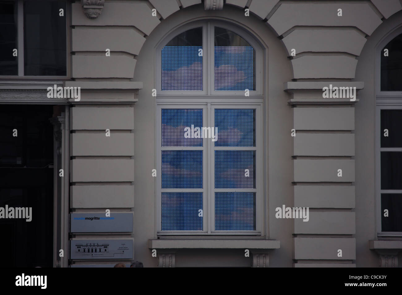 Entrance and window of the Magritte Museum in Brussels, Belgium. The ...