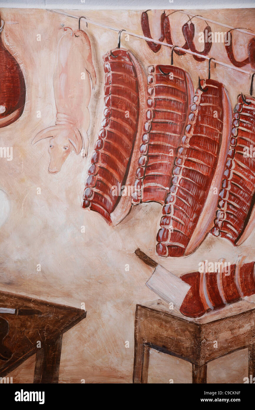 Wall painting on a butcher shop, San Pantaleo village, Sardinia, Italy ...