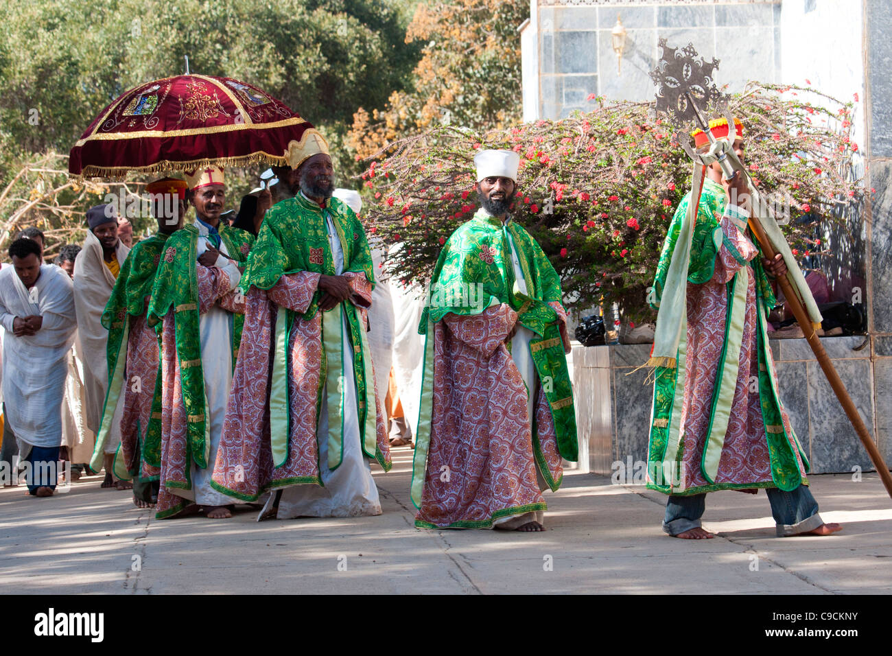 Orthodox Christian priests lead a procession of devotees around the new ...