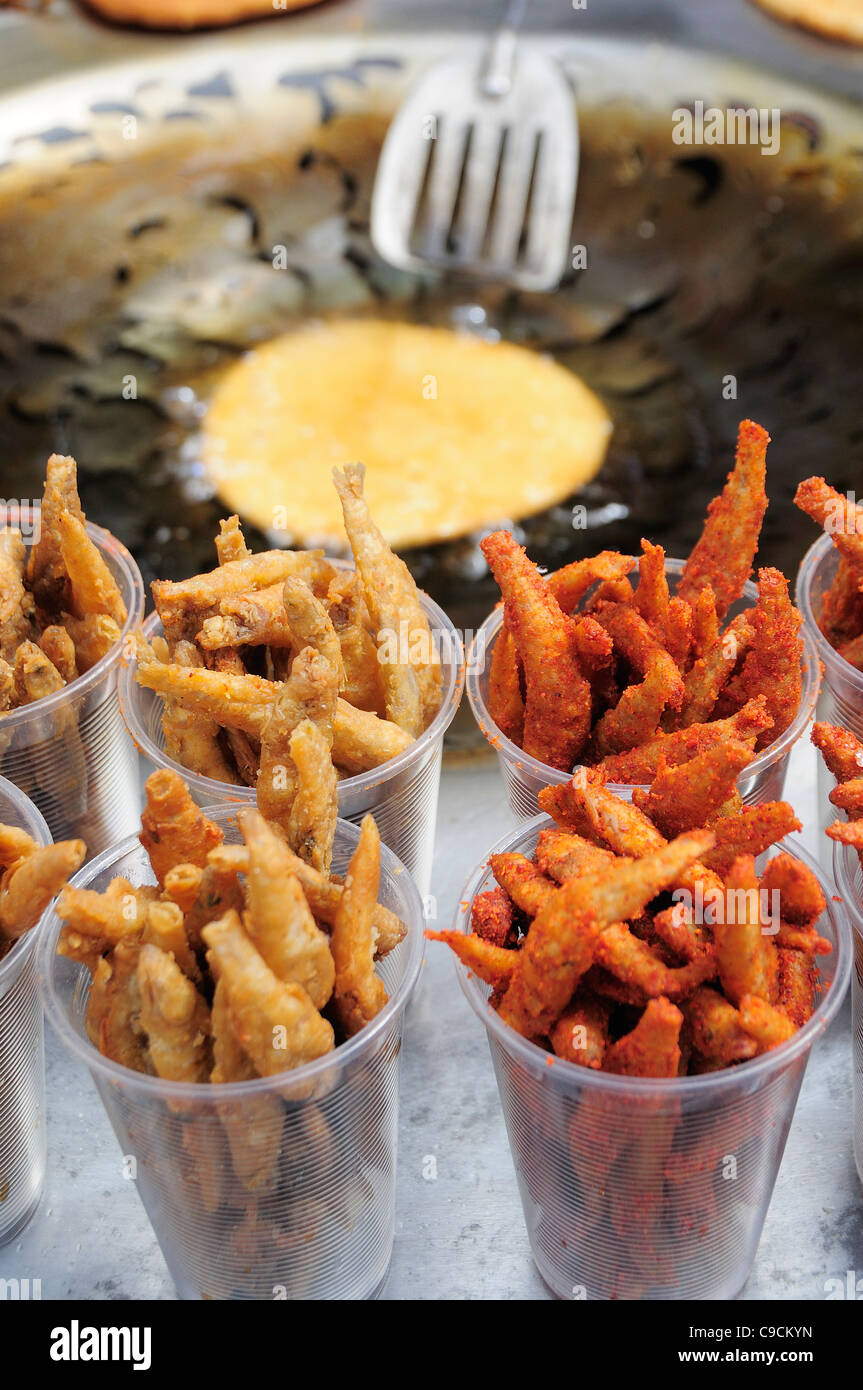 Mexico, Michoacan, Patzcuaro, Fried fish snacks for sale in market ...