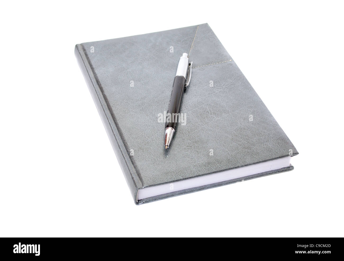 Daily planner with pen on a white background Stock Photo - Alamy
