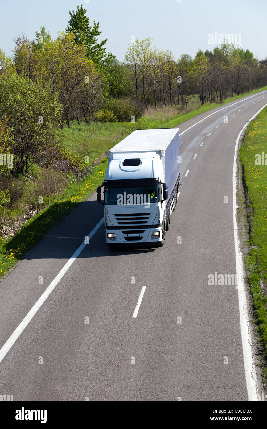 Truck transport on freeway Stock Photo - Alamy