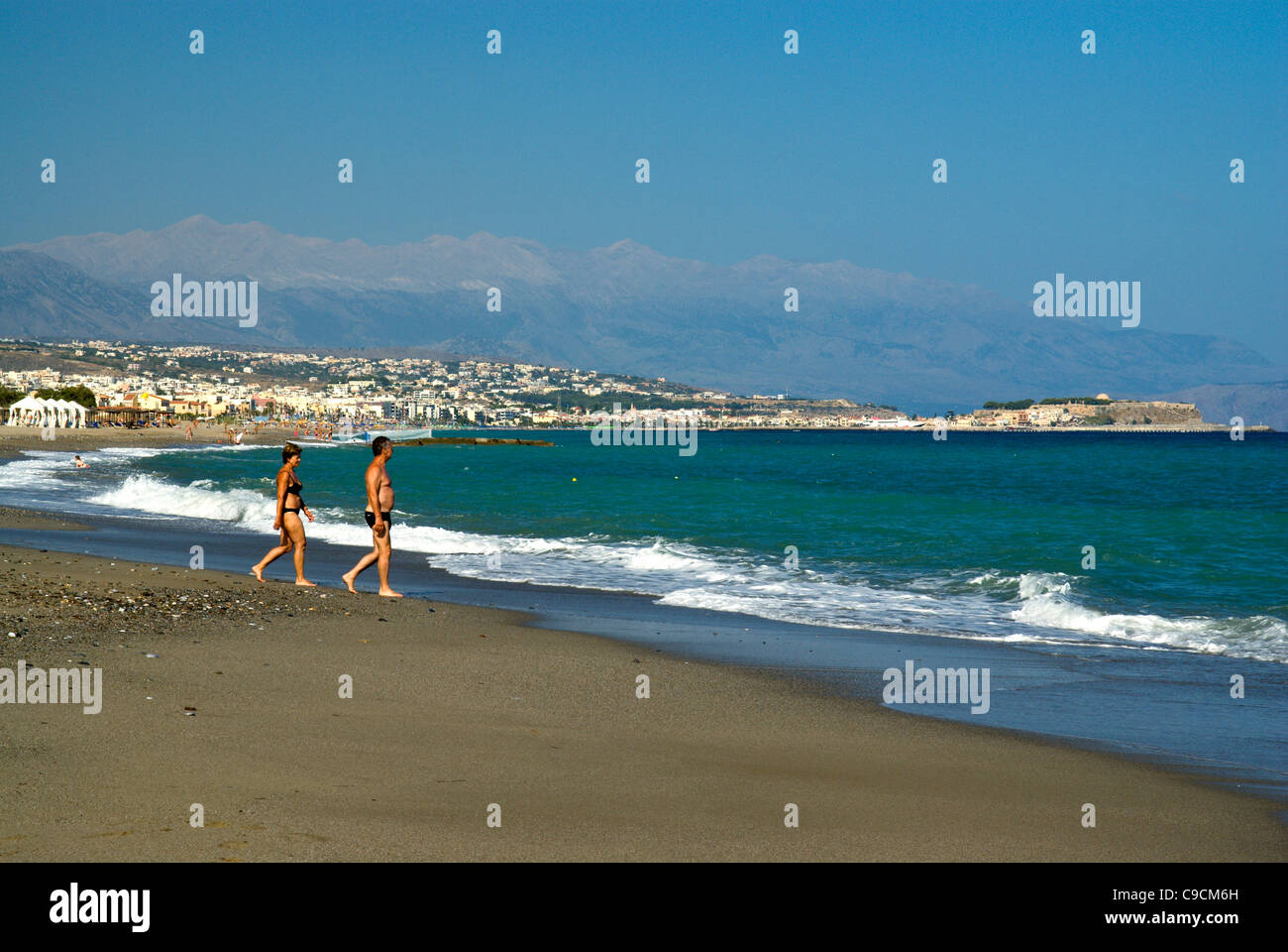 couple on beach, rethymnon, crete, greece Stock Photo - Alamy