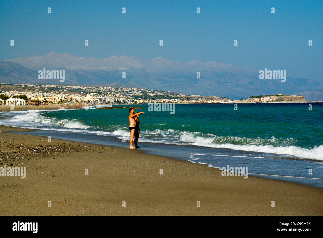 couple on beach, rethymnon, crete, greece Stock Photo - Alamy