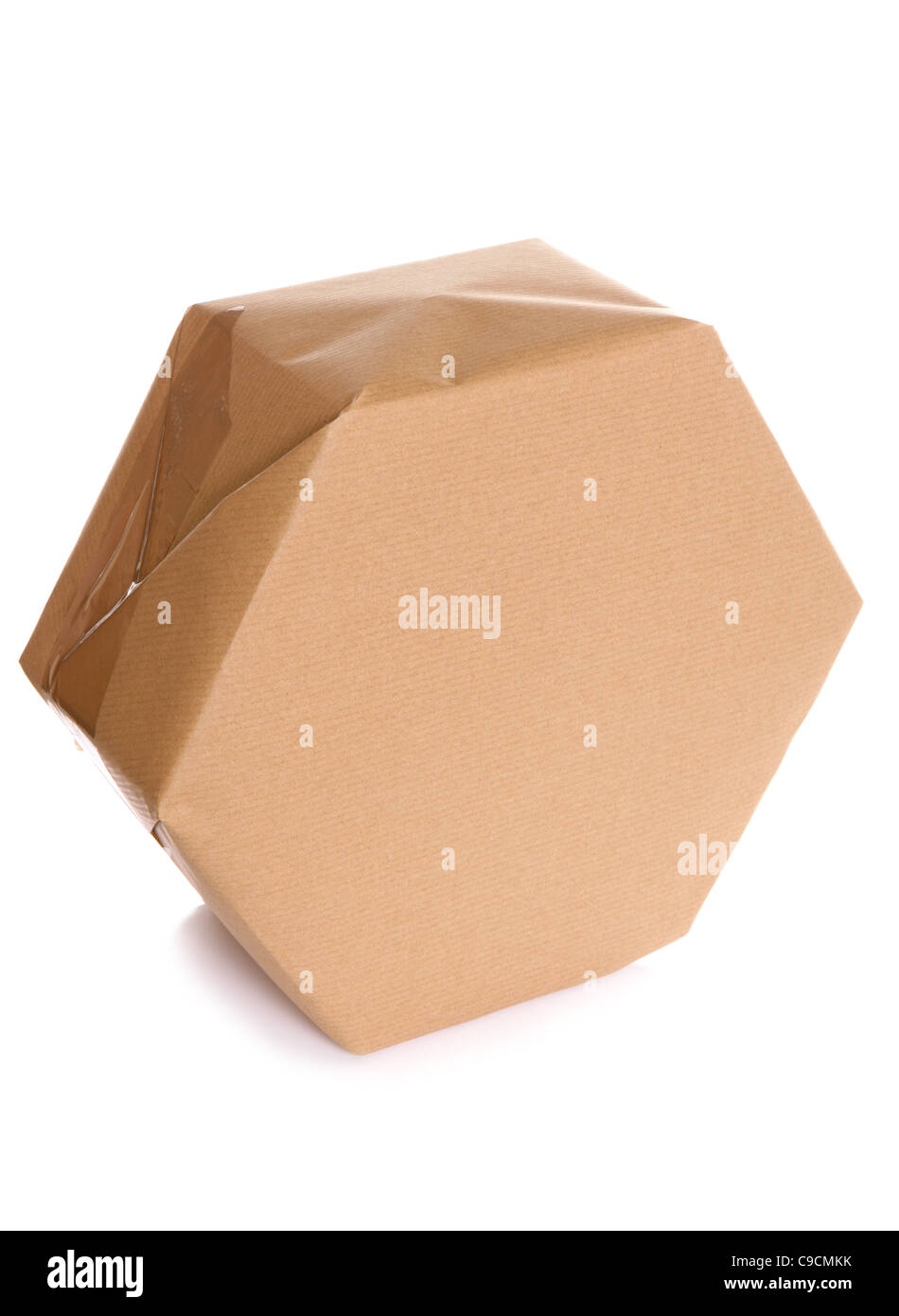 Parcel wrapped in brown paper studio cutout Stock Photo - Alamy
