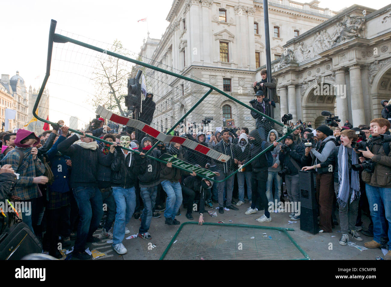 Demonstration crowded building exterior standing holding photograph ...