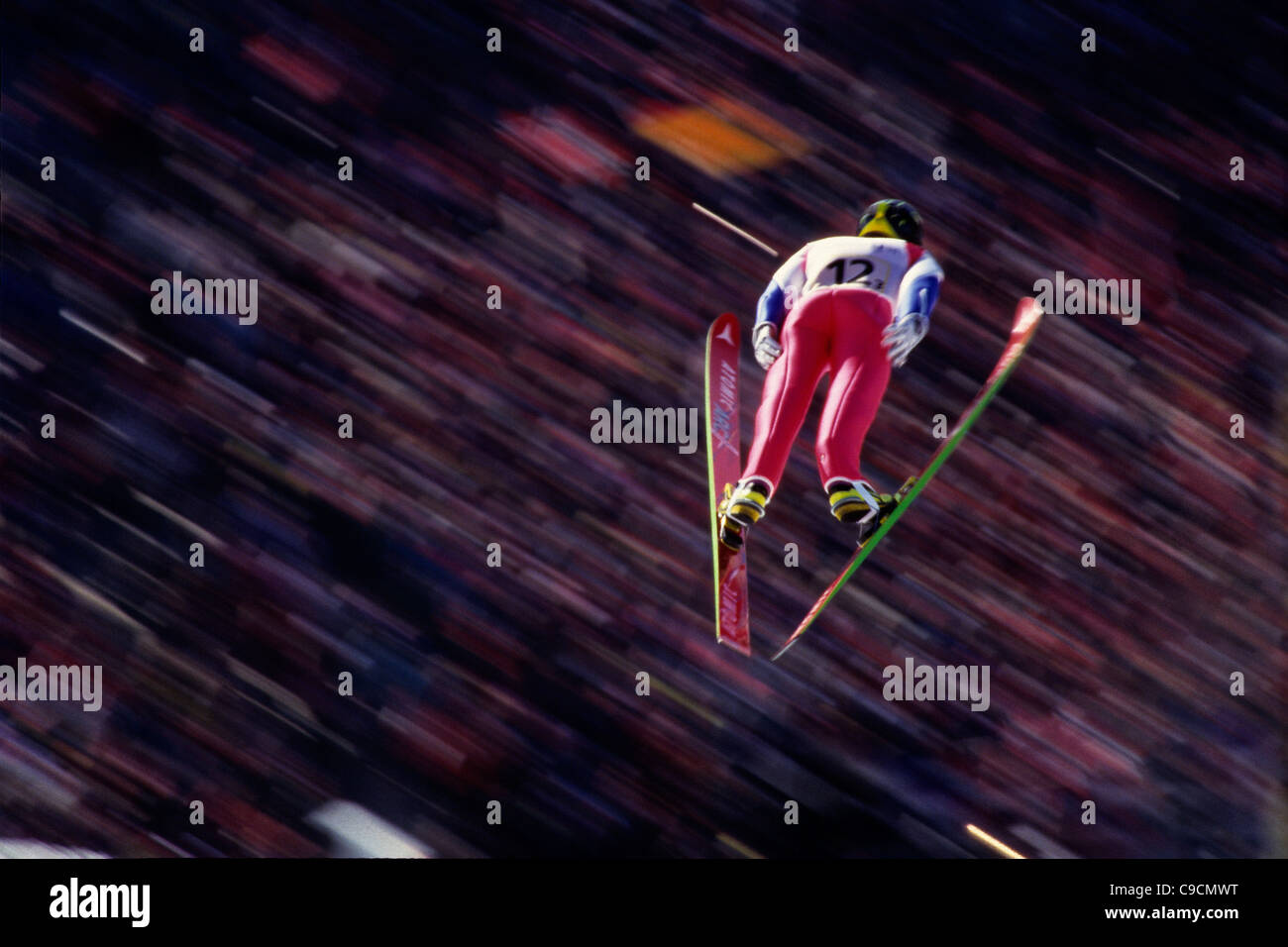 Ski jumper flying through the air Stock Photo - Alamy
