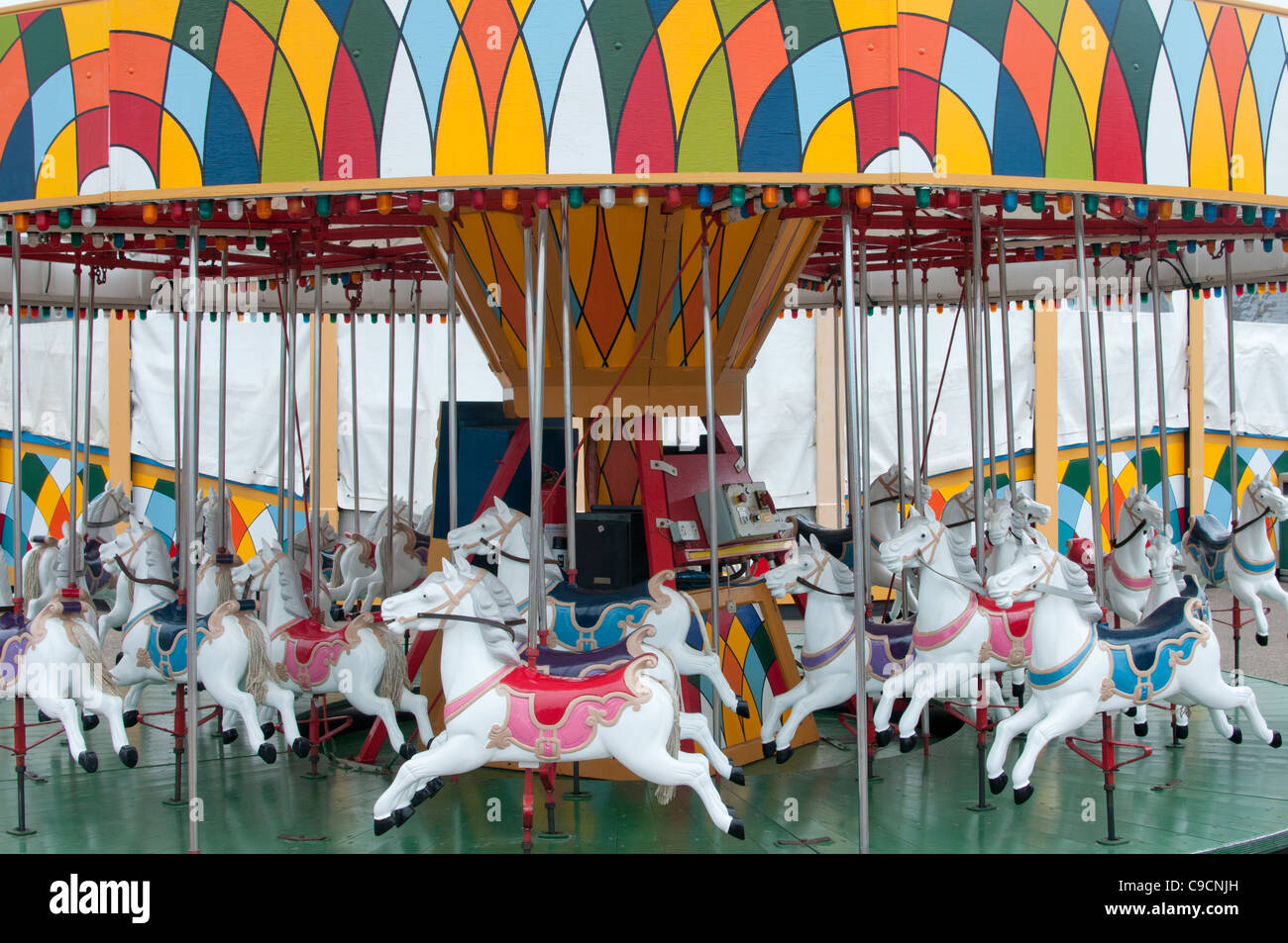 Children fairground carousel horses hi-res stock photography and images ...