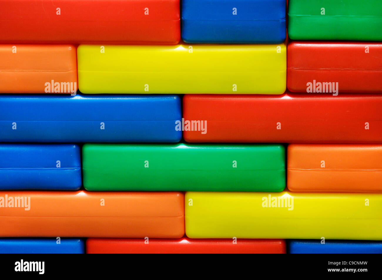 Closeup of color building blocks for background Stock Photo - Alamy