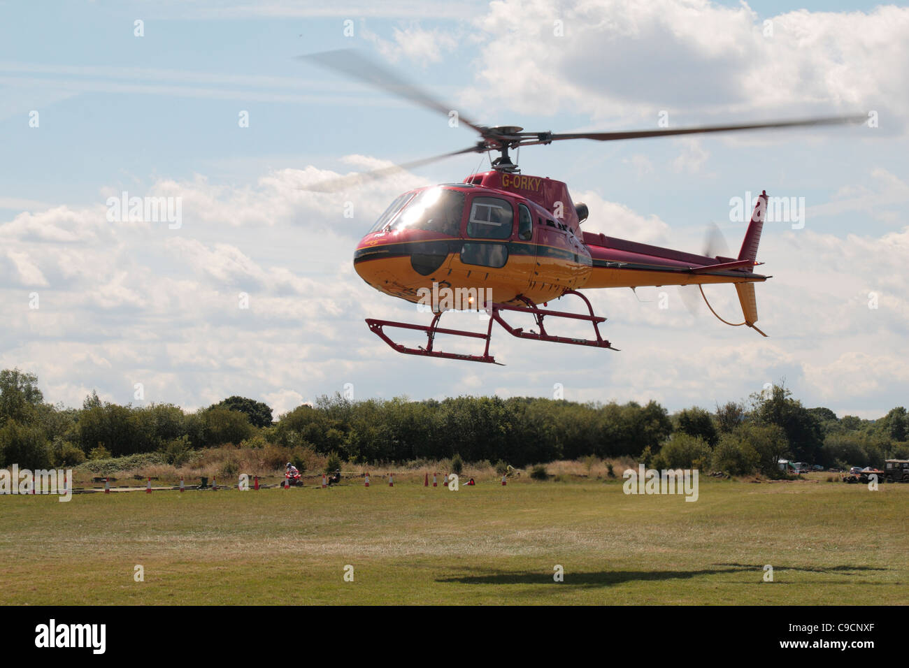 A tourist helicopter coming in to land at the 2011 War & Peace Show at ...
