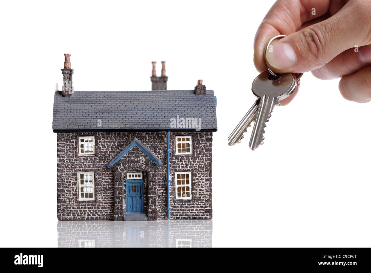Giving house keys Stock Photo - Alamy