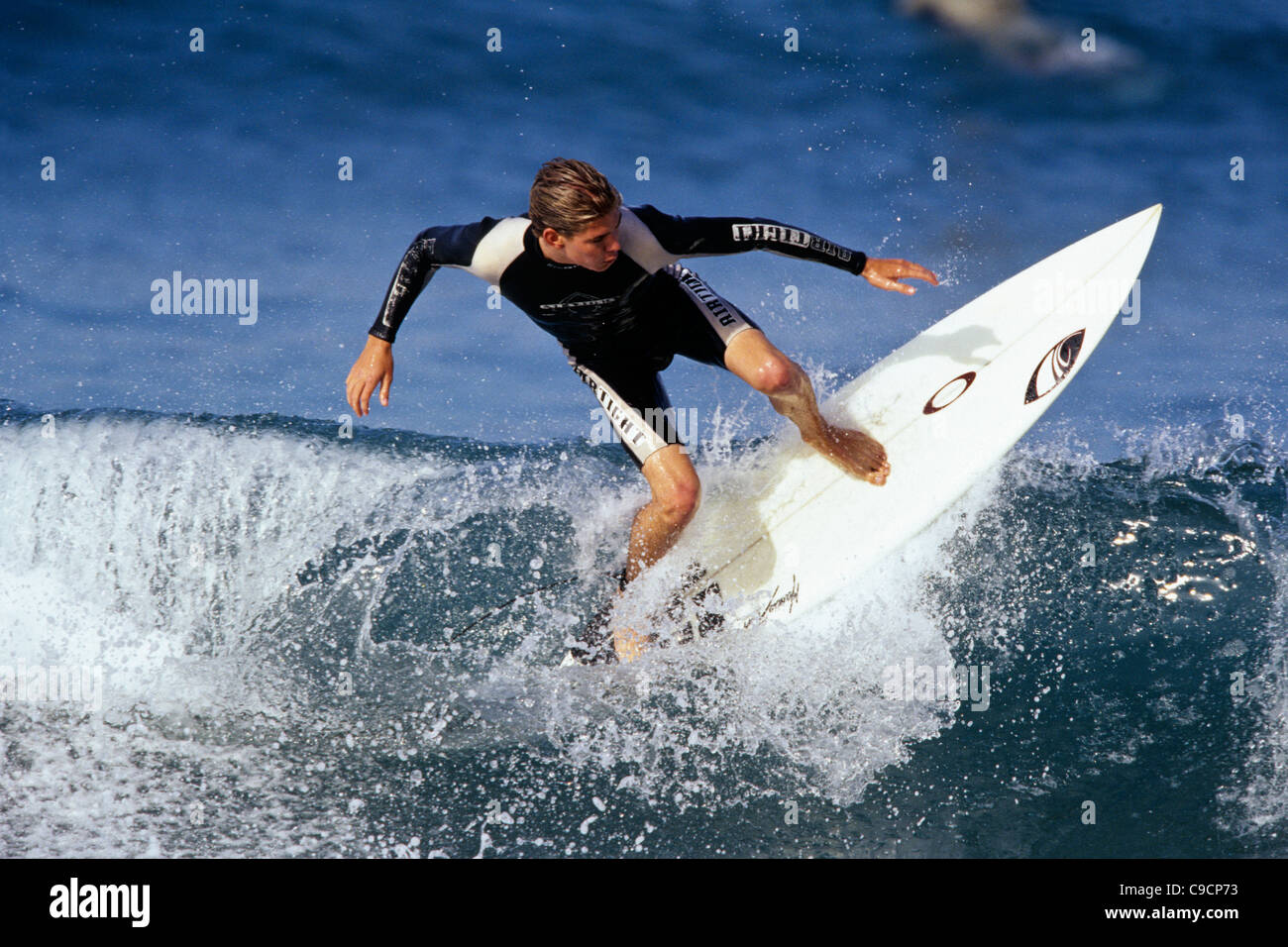 Teen male surfer Stock Photo - Alamy