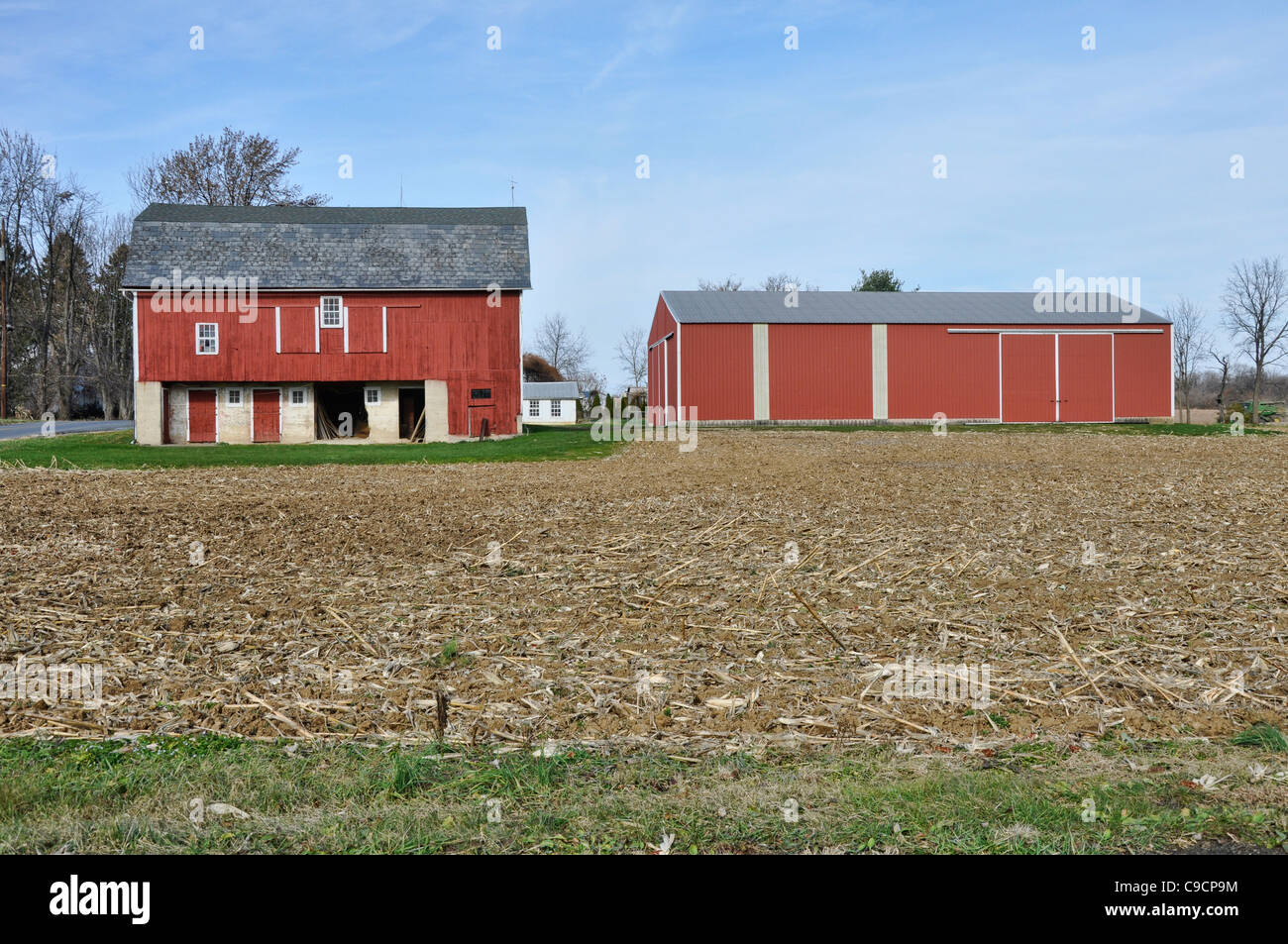 old and new red barns Stock Photo - Alamy