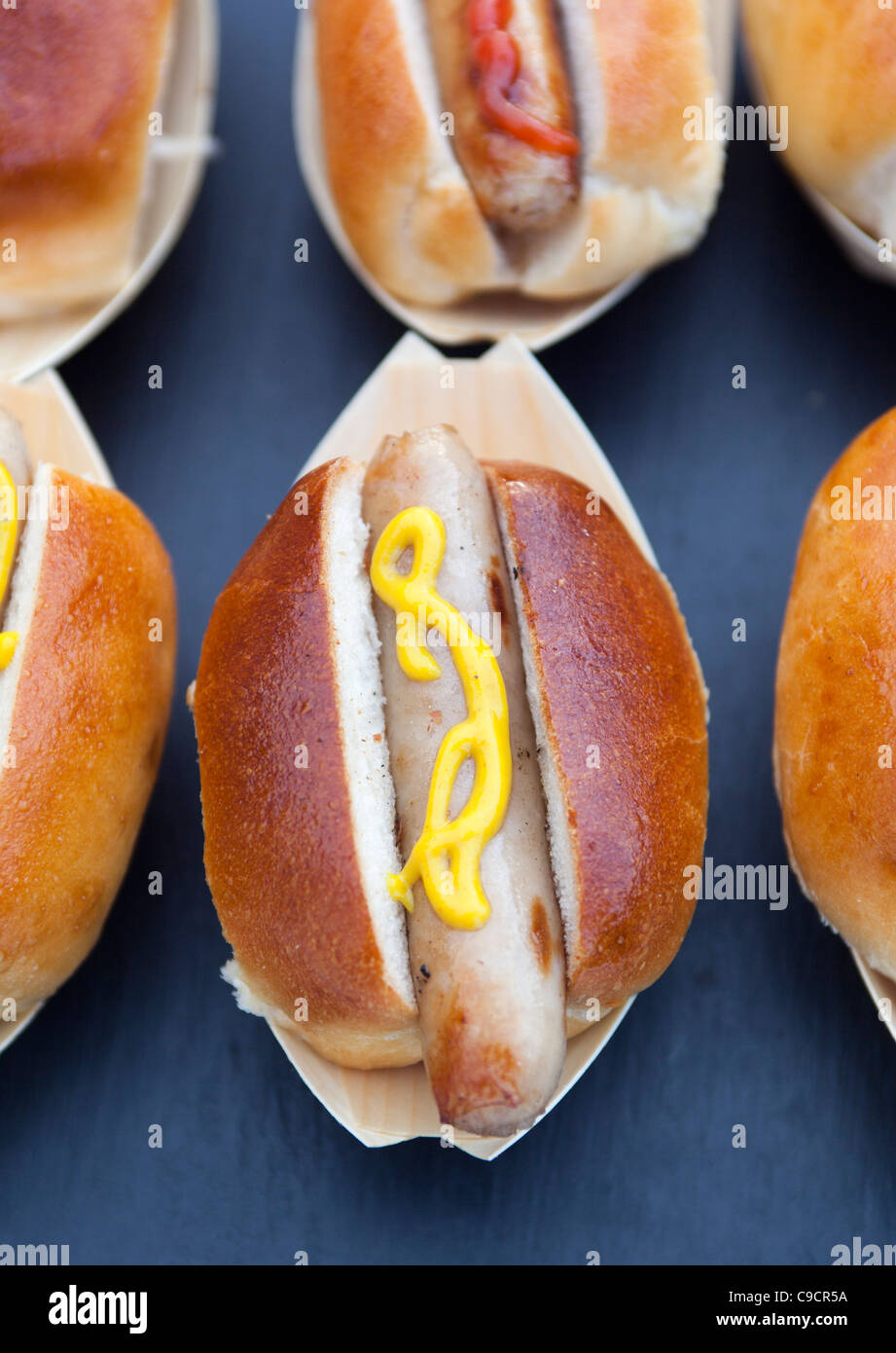 Hot Dog with Mustard Stock Photo - Alamy