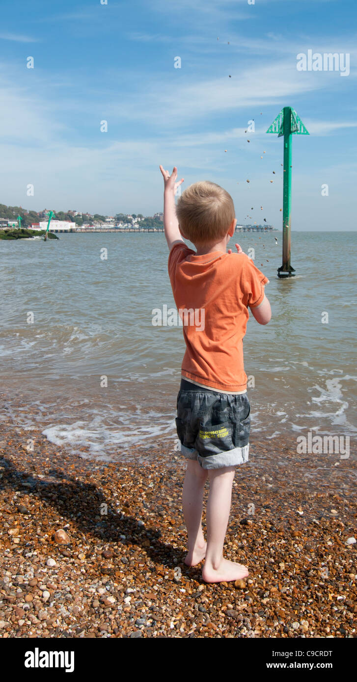 Throwing pebbles sea hi-res stock photography and images - Alamy