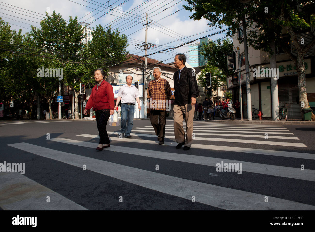 Chinese people using the crossing Stock Photo - Alamy