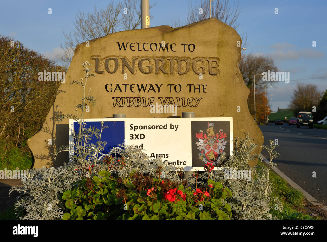 Stone sign ,welcome to Longridge Stock Photo - Alamy