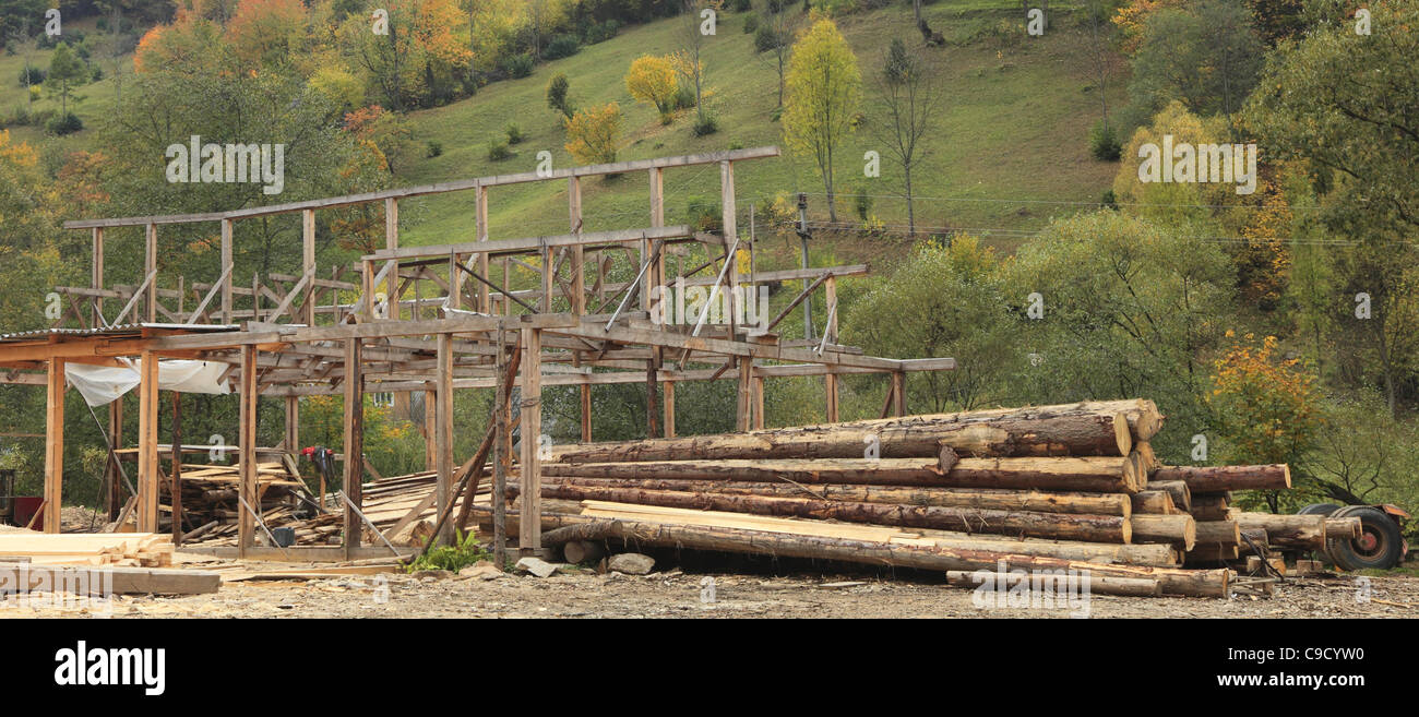 Image of a timber production place in a forested region Stock Photo - Alamy