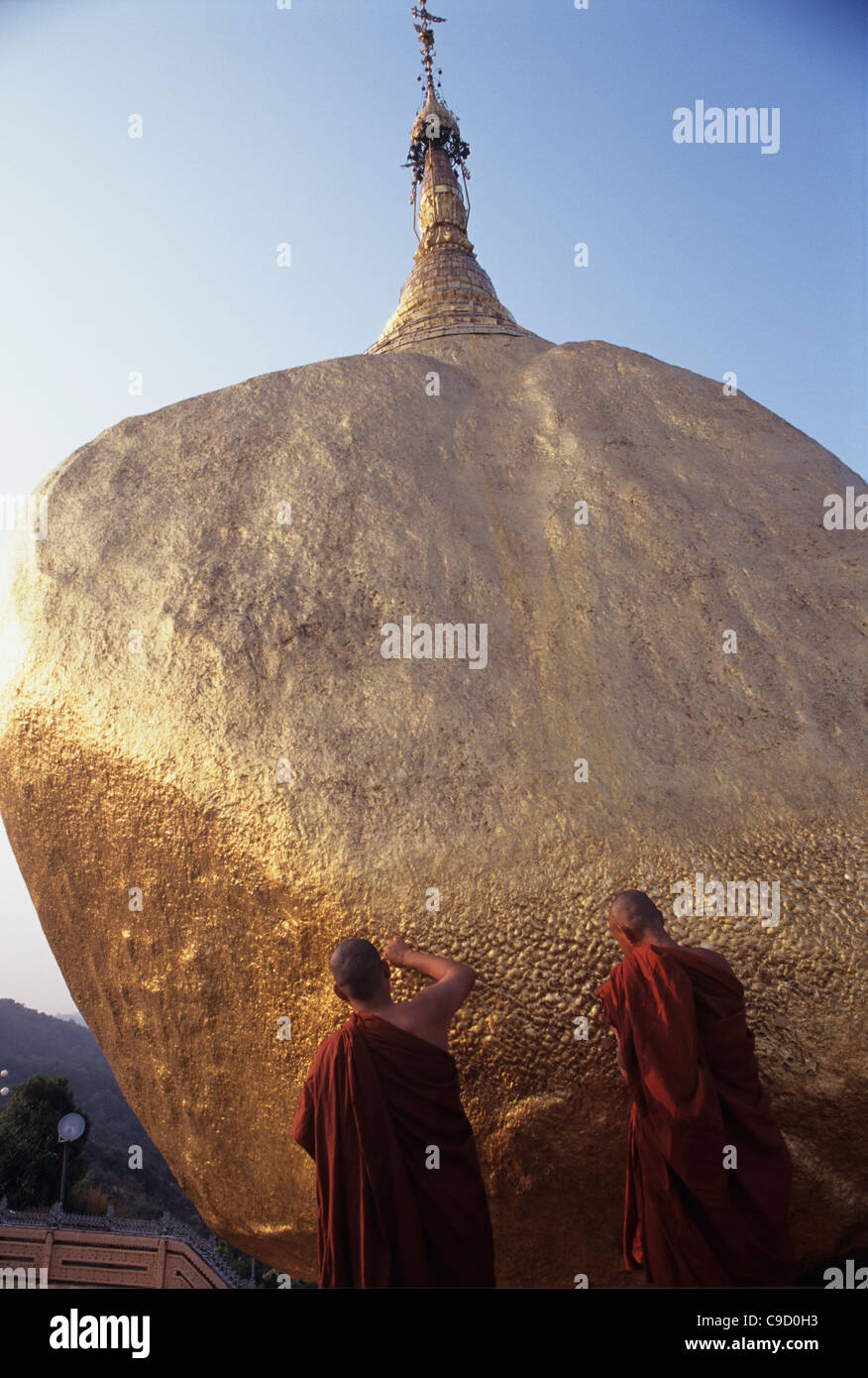 Kyaiktiyo Pagoda, Golden Rock, Monks making offering of Gold Stock ...