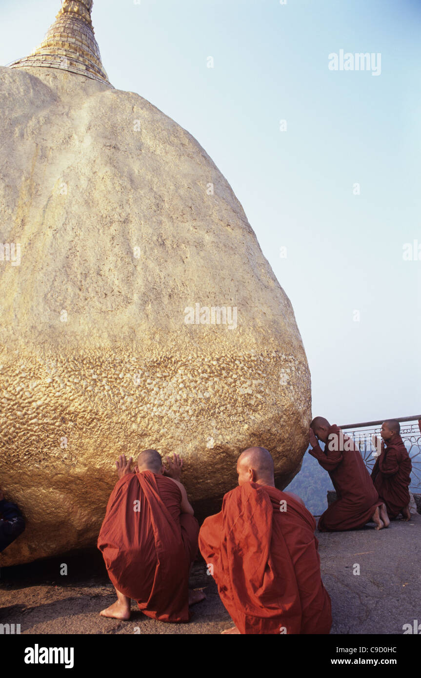Kyaiktiyo Pagoda, Golden Rock, Monks making offering of Gold and ...