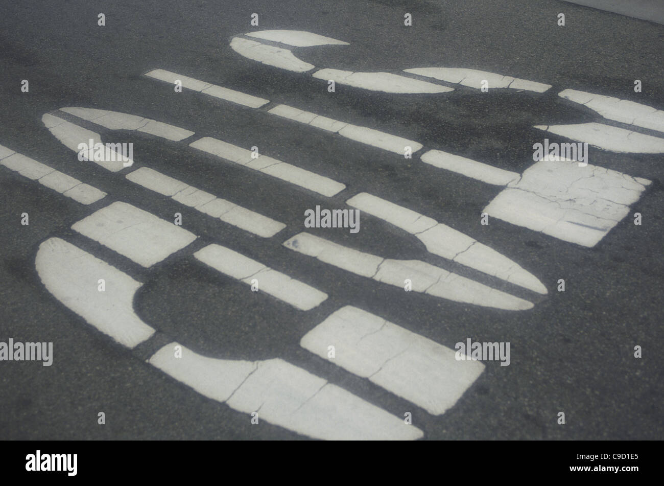 Stop sign painted on a road Stock Photo - Alamy