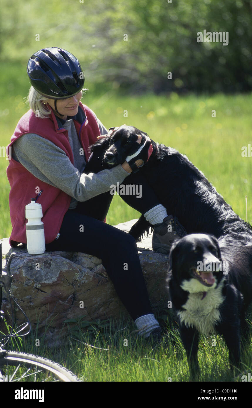Woman with two dogs hi-res stock photography and images - Alamy