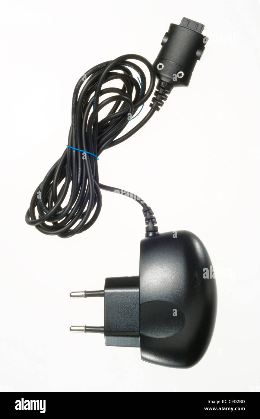 Electrical charging power unit with wrapped cord and plug Stock Photo ...