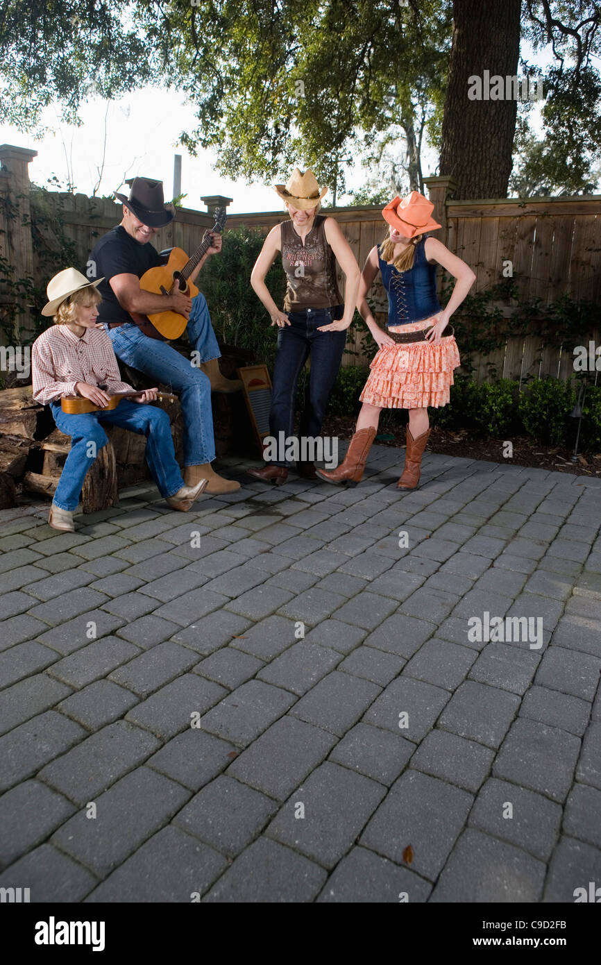 Family playing country music and dancing together Stock Photo - Alamy