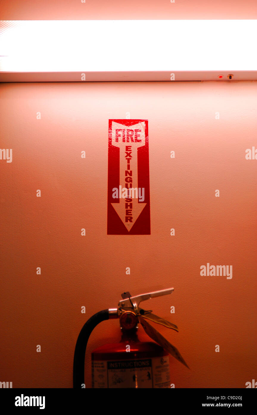 Fire extinguisher sign with direction hi-res stock photography and ...