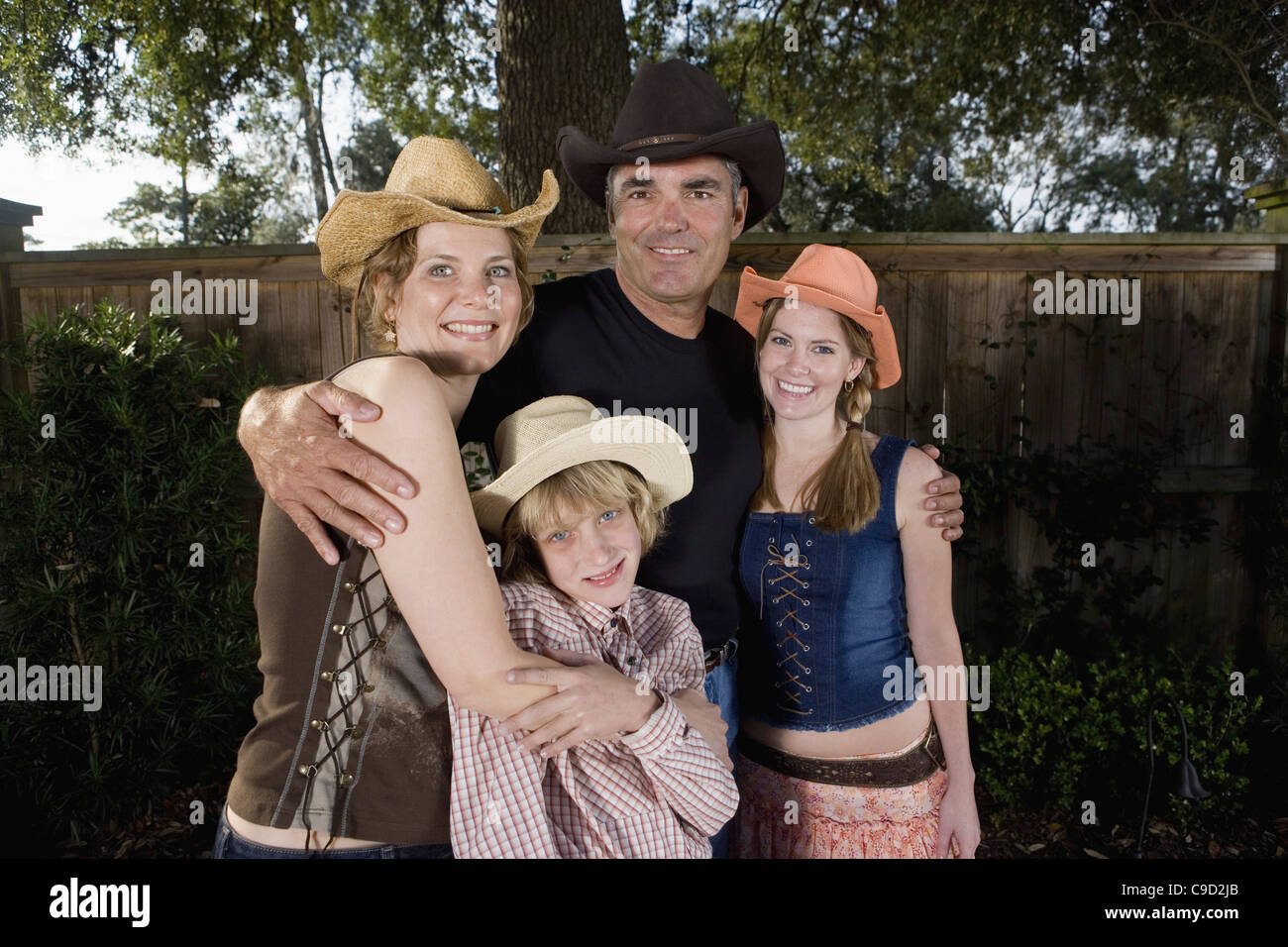 Portrait of a happy country family Stock Photo - Alamy