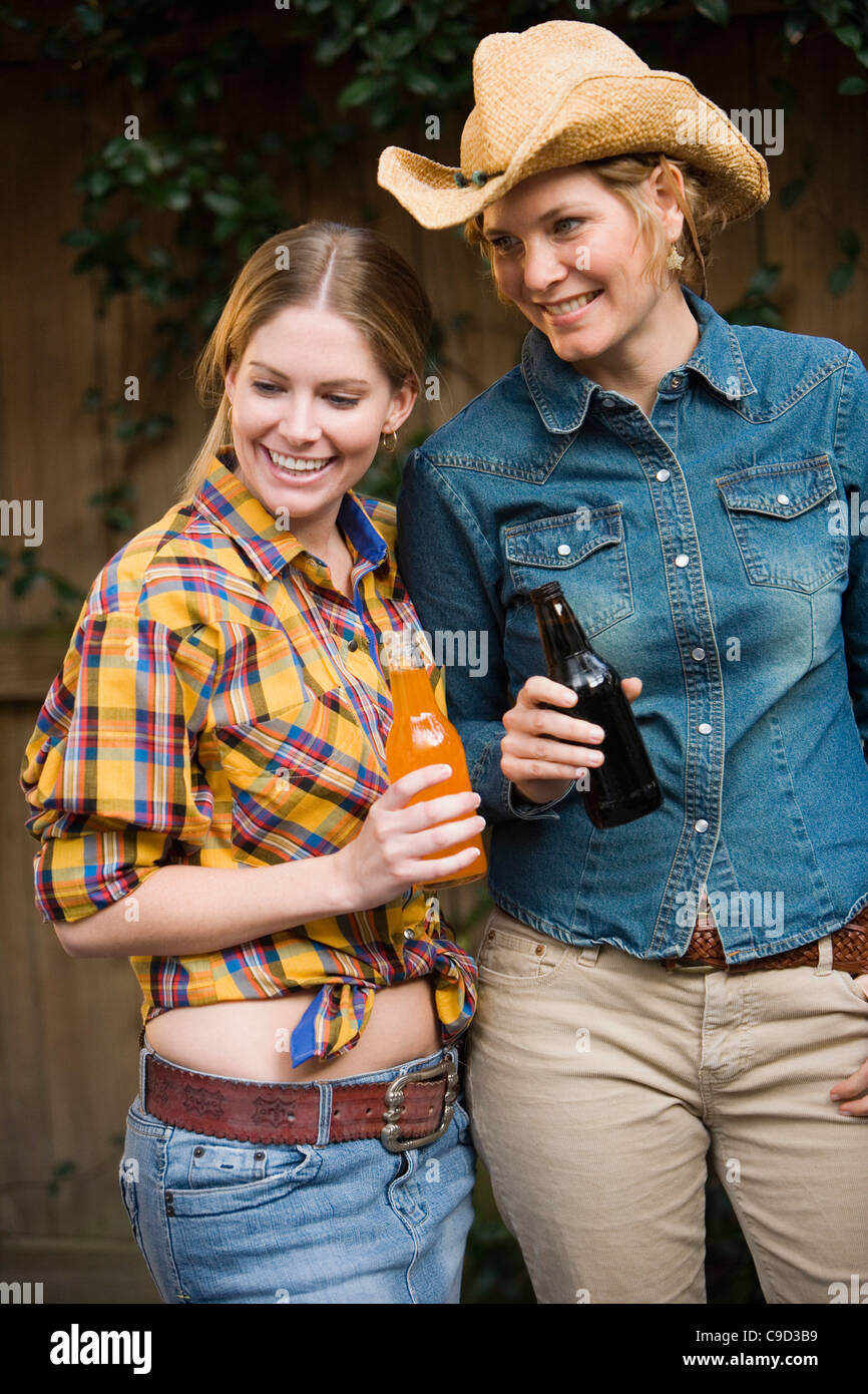 Country mother and daughter standing together Stock Photo - Alamy