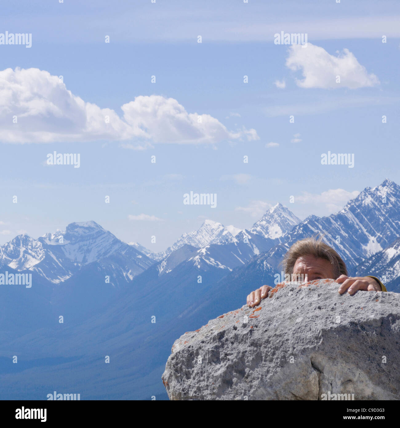 Canada, Alberta, Climber reaching summit of mountain Stock Photo - Alamy