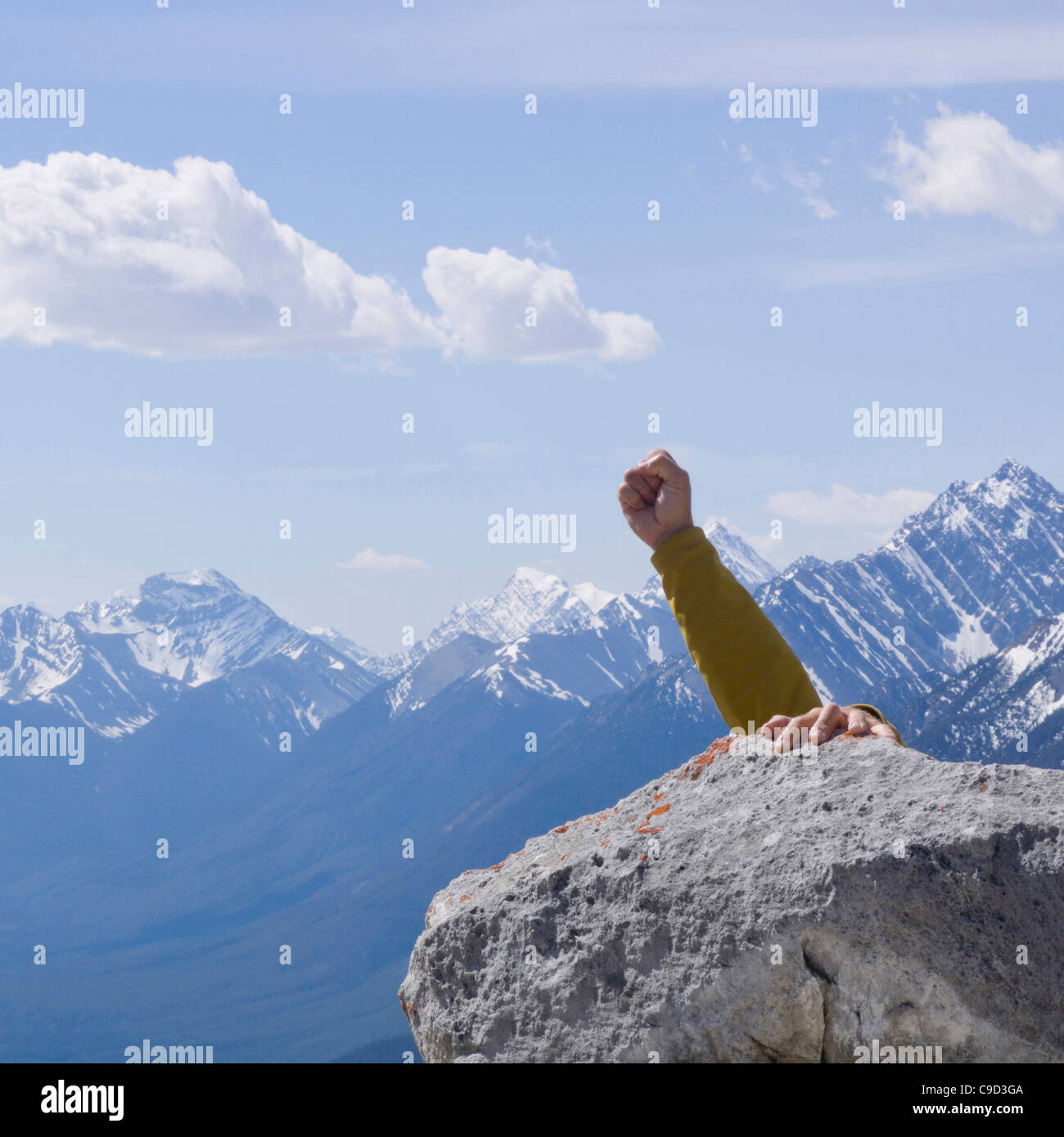 Canada, Alberta, Climber reaching summit of mountain Stock Photo - Alamy