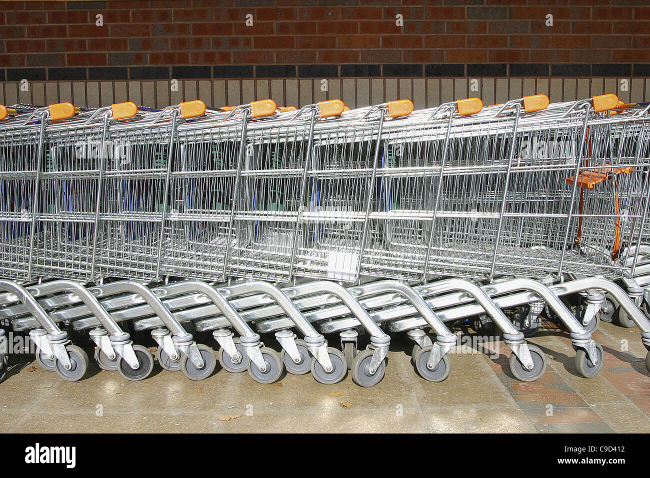 Shopping carts in a row Stock Photo - Alamy