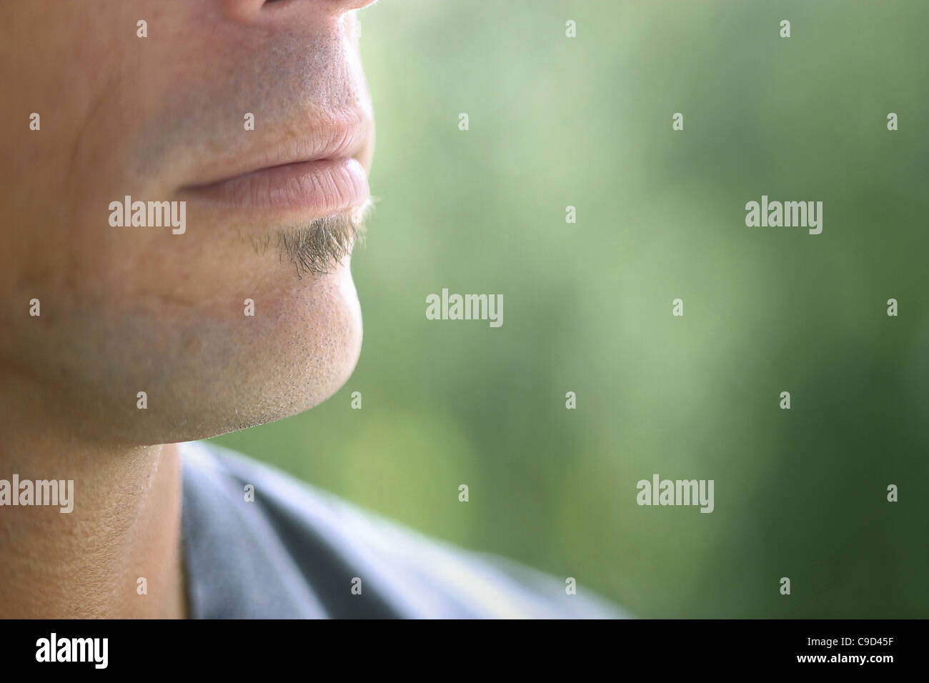 Close-up of a young man's mouth Stock Photo - Alamy