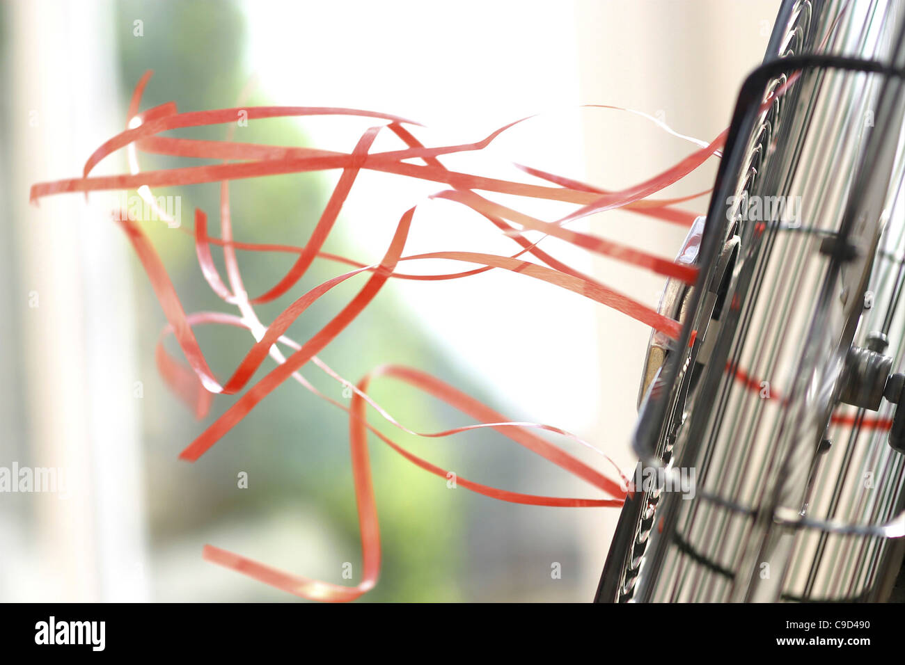 Close-up of an electric fan blowing attached streamers Stock Photo - Alamy